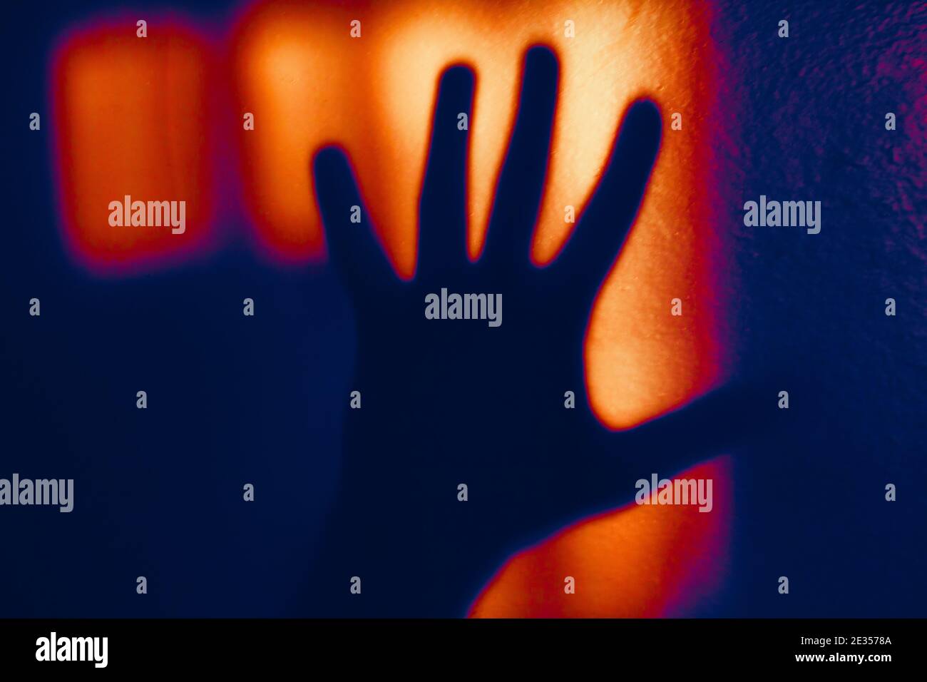 Shadow of the hand on the wall . Fingers in the dim light Stock Photo ...