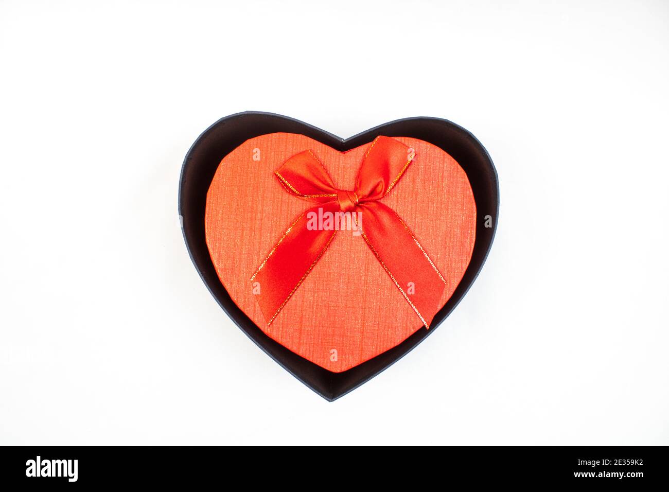 A top view shot of two open heart shaped gift boxes folded in each ...