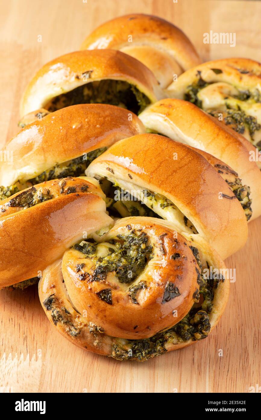 Luscious green spinach twisted with crumbled fetta Stock Photo - Alamy