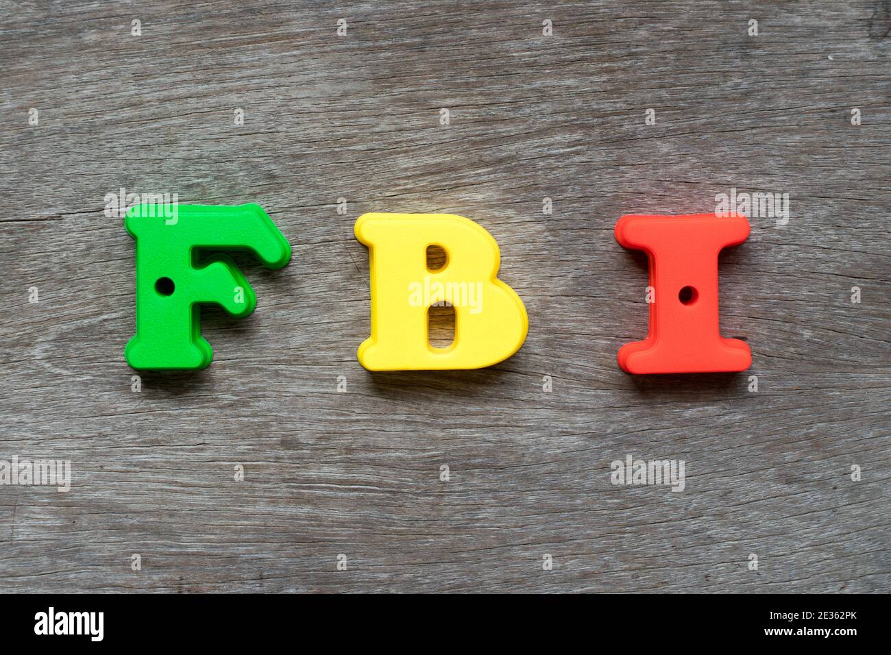 Colorful plastic alphabet in word FBI (Abbreviation of Federal Bureau ...