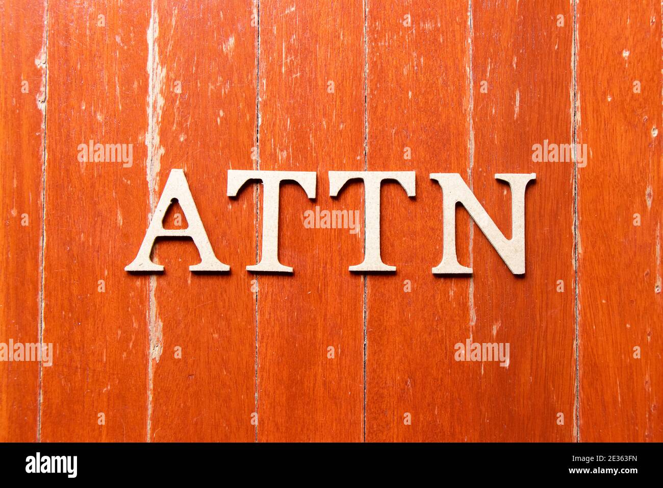 Alphabet letter in word attn (Abbreviation of attention) on old red ...