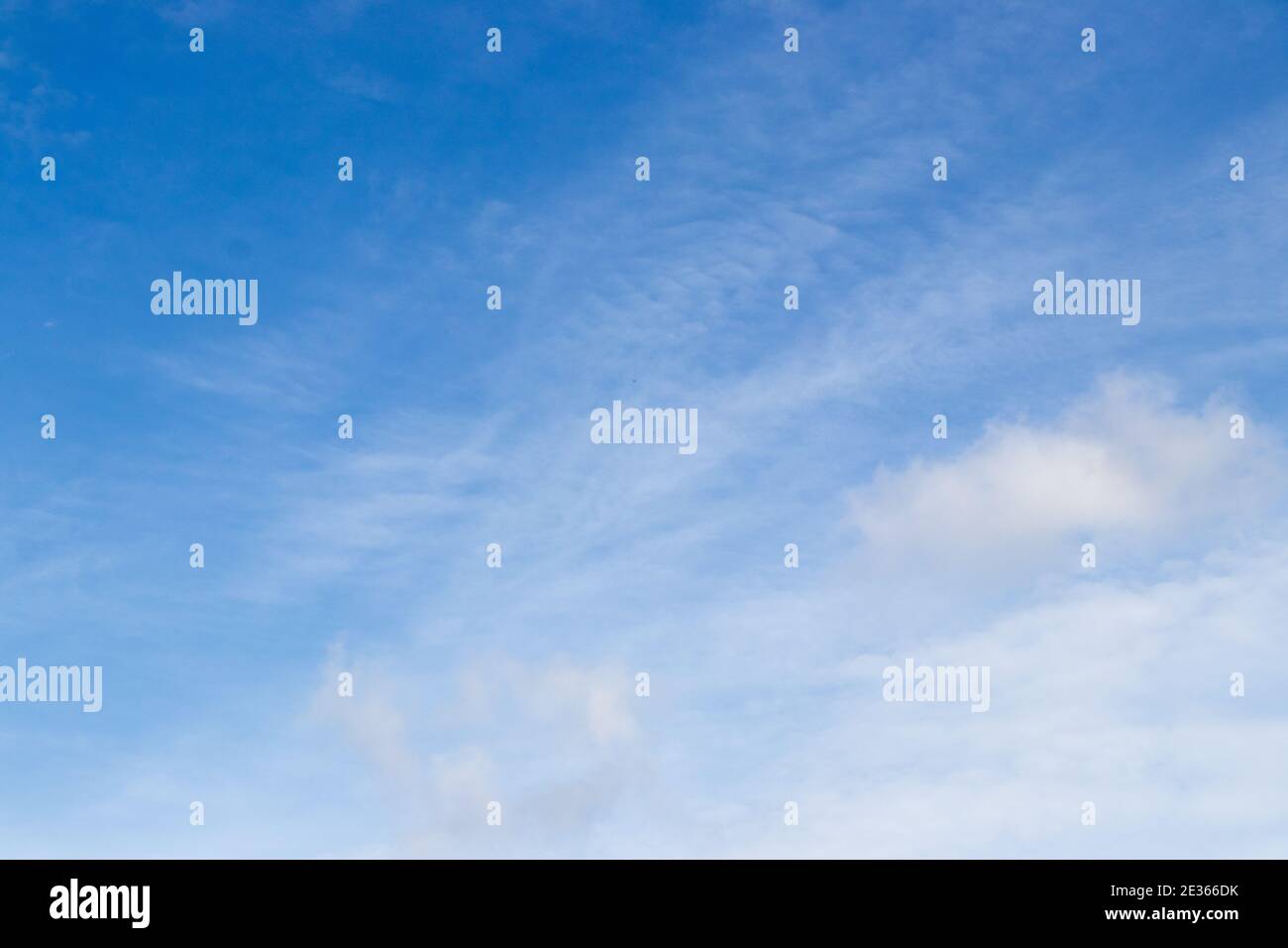 Clear blue color sky with white cloud background Stock Photo - Alamy