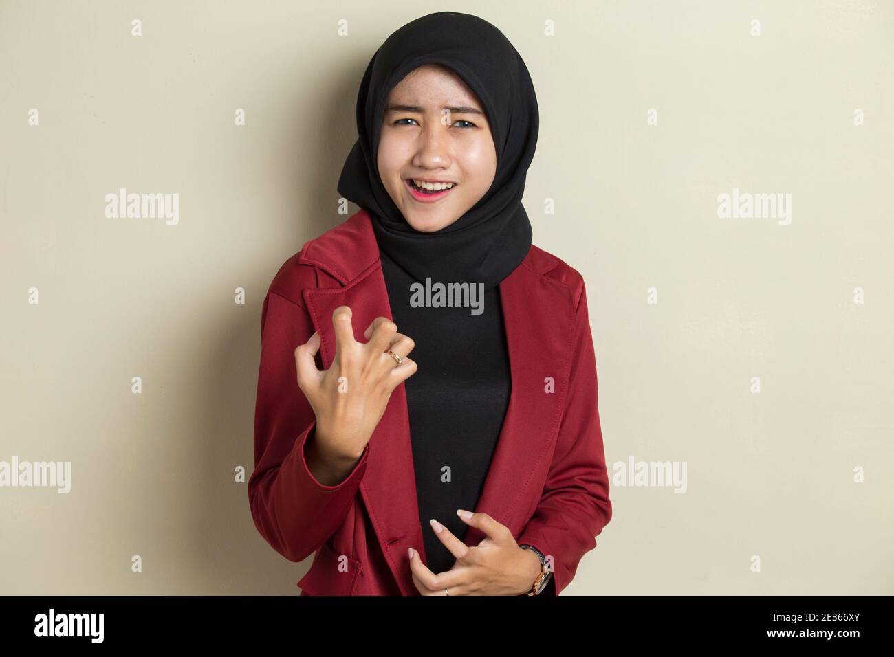 Screaming, hate and rage concept. Angry emotional muslim woman in hijab ...