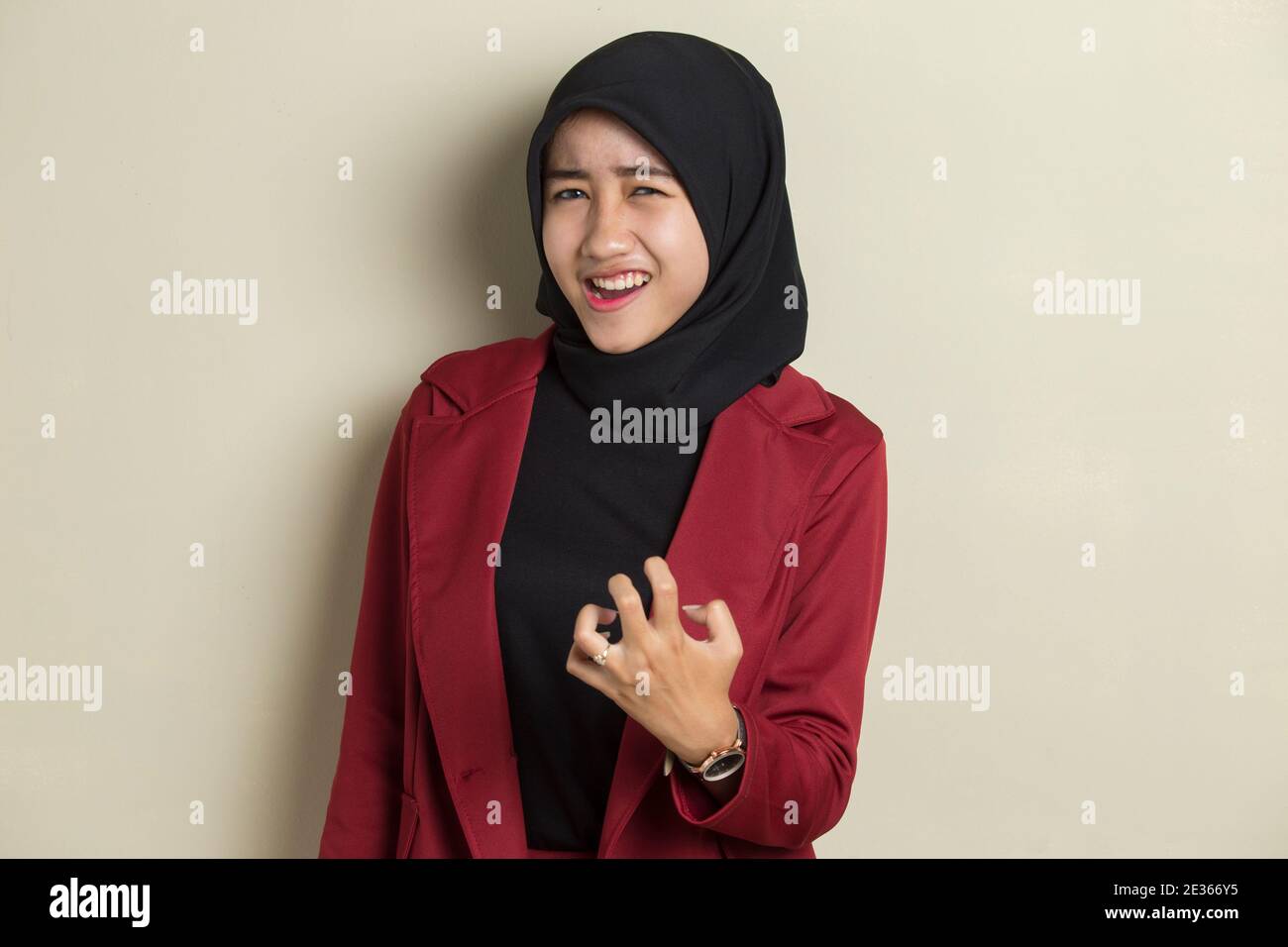 Screaming, hate and rage concept. Angry emotional muslim woman in hijab ...