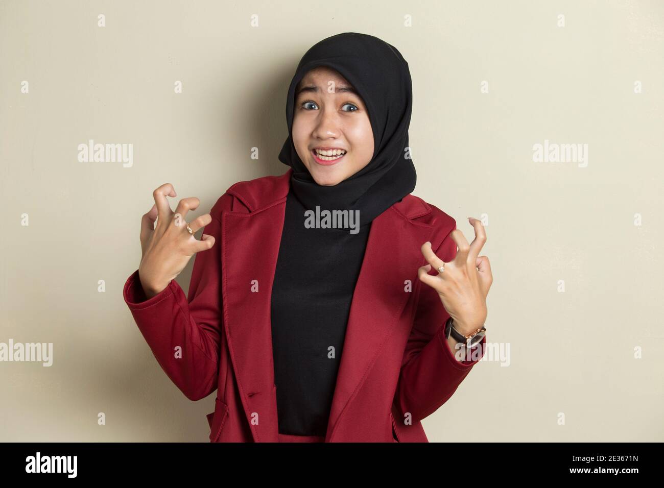 Screaming, hate and rage concept. Angry emotional muslim woman in hijab ...