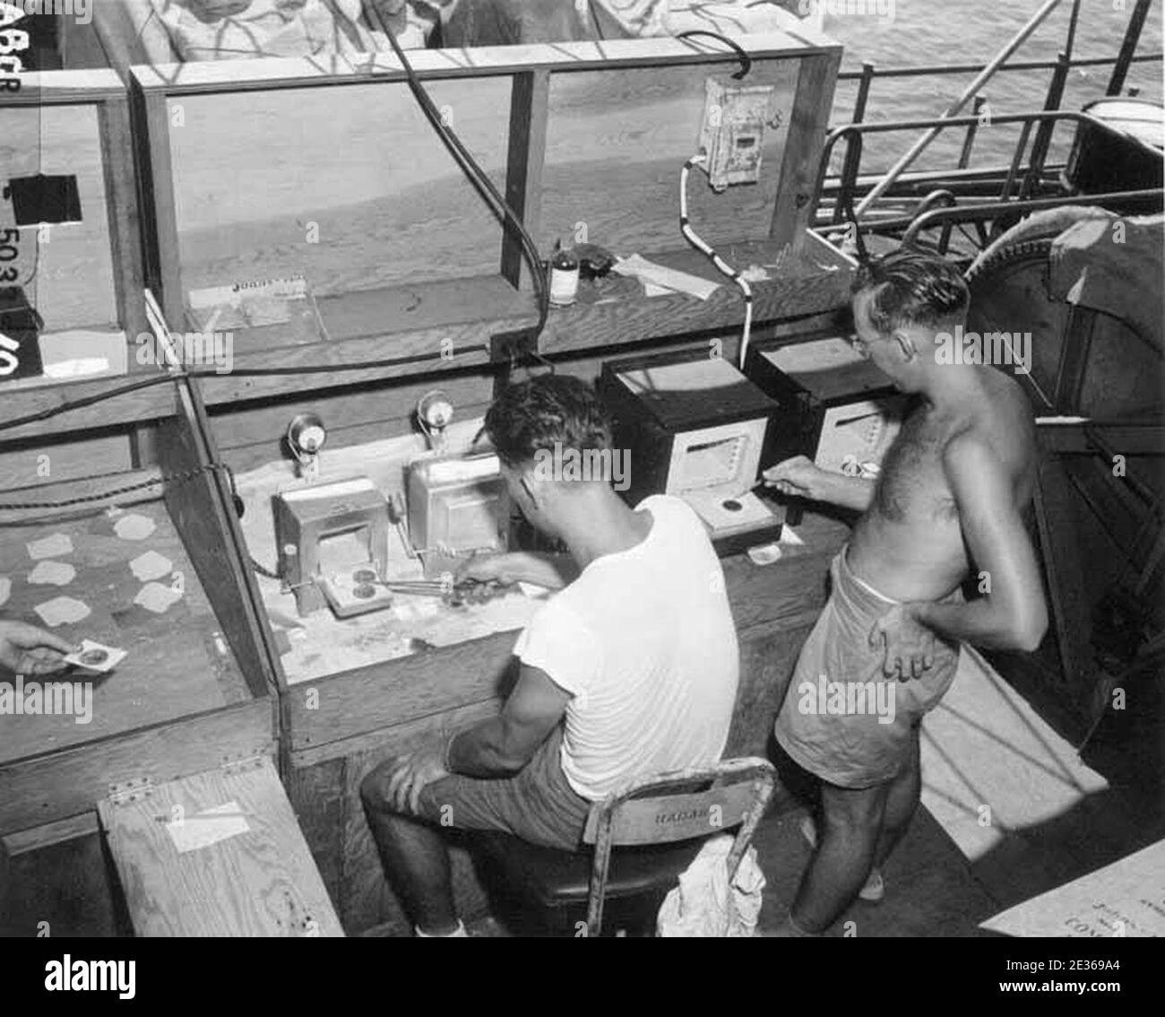 M K Nichols and R F Foster ashing fish specimens for radiation ray ...