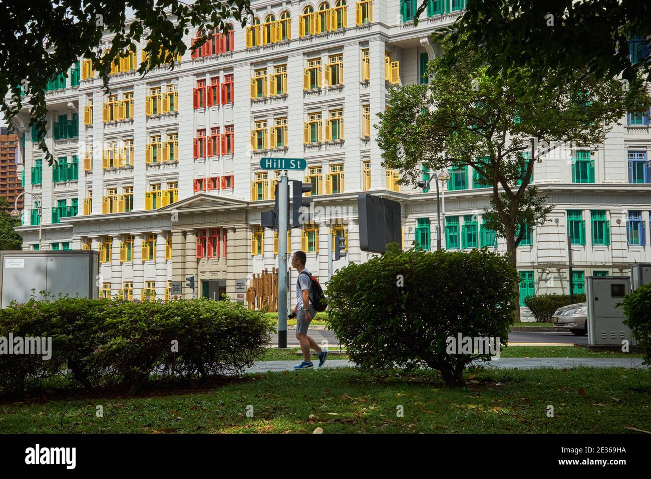 A lone pedestrian passes in front of the building of the Ministry of ...