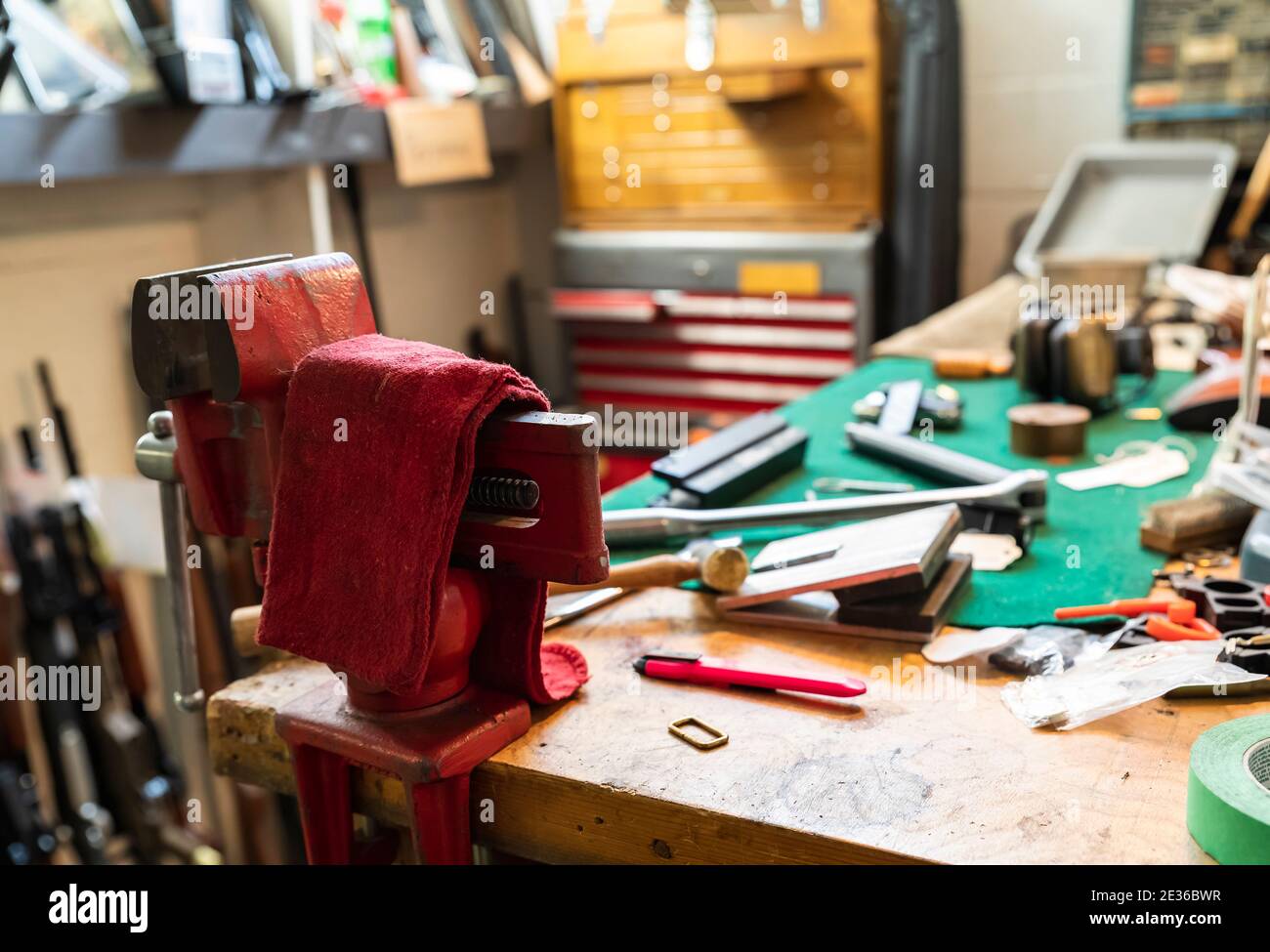 Gunsmithing tools on a working table at a gun shop in California ...