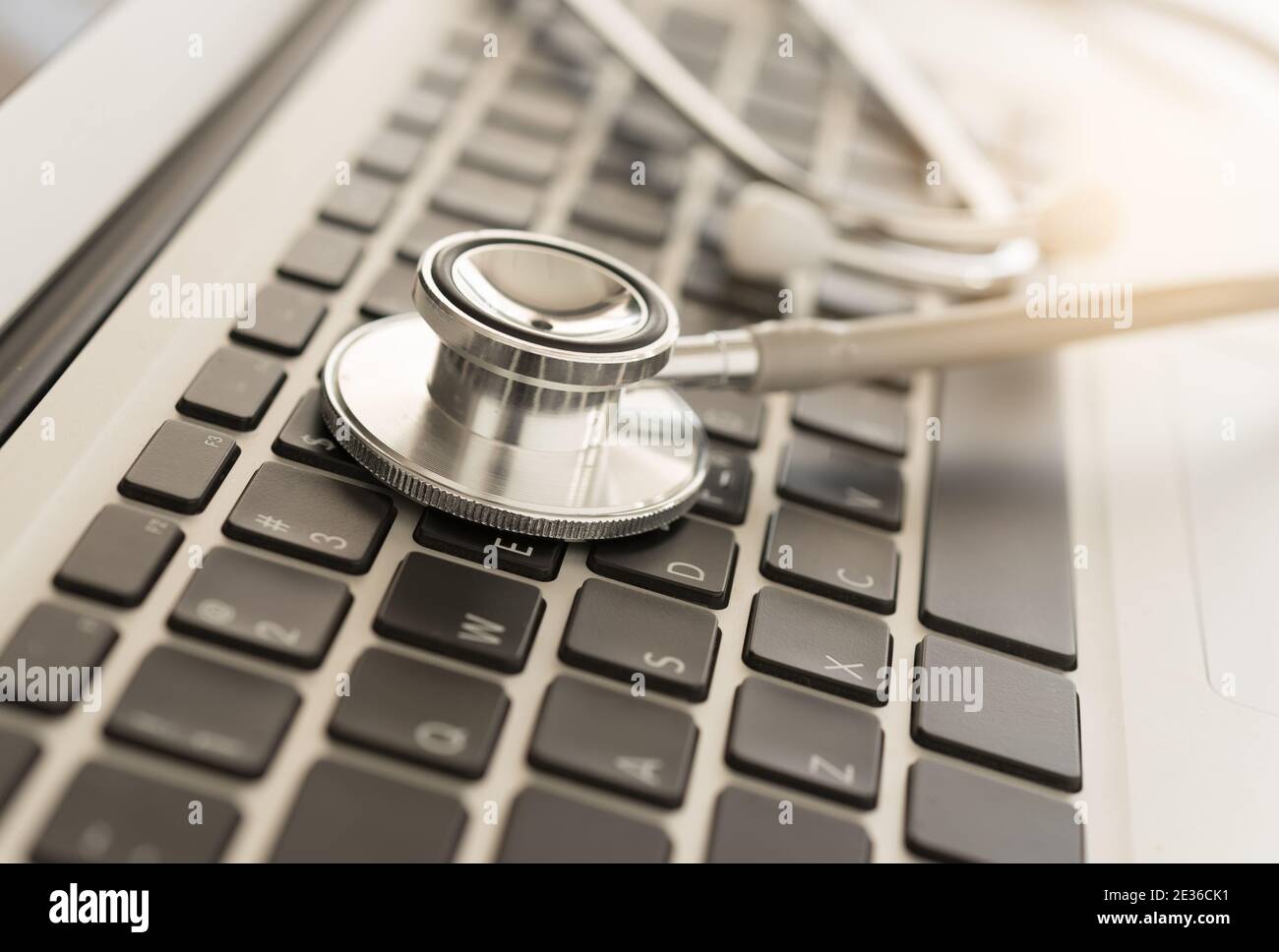 Stethoscope medical on laptop keyboard. antivirus protection or repair ...