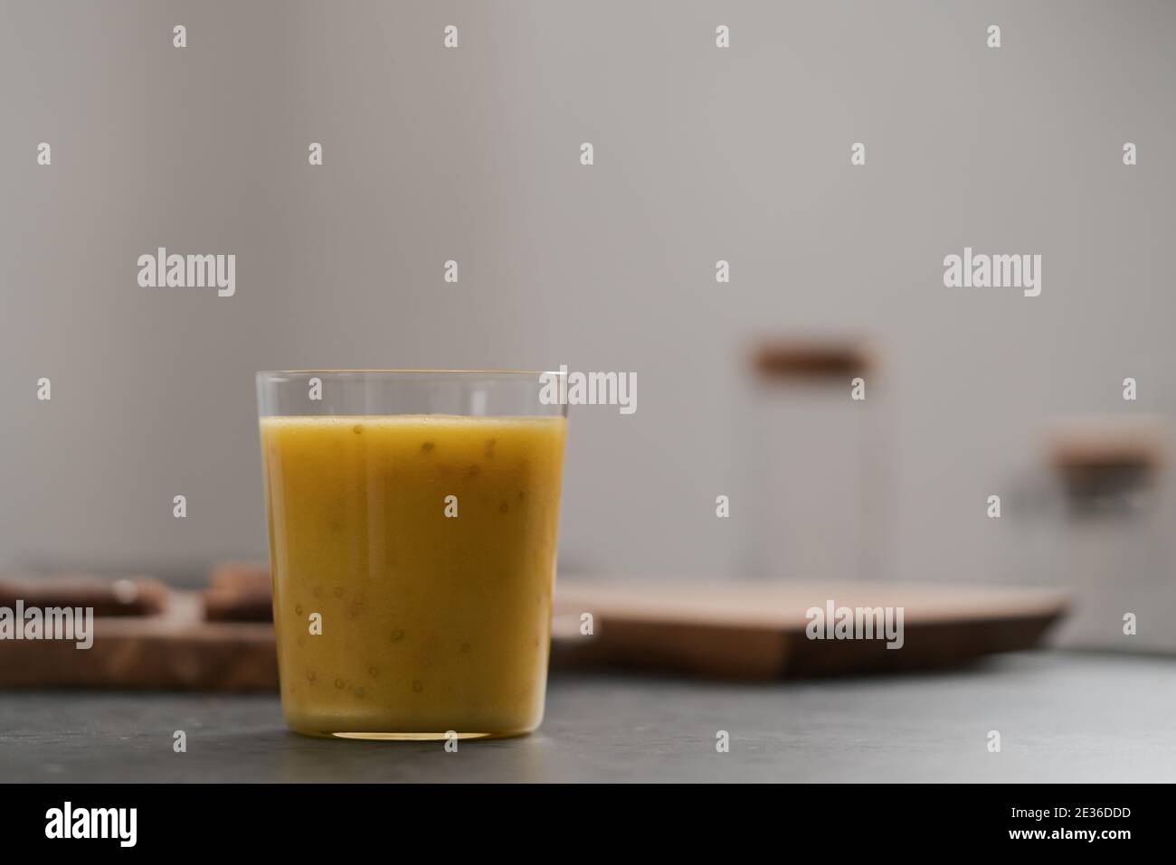 Fresh mango lulo smoothie on kitchen countertop, shallow focus Stock ...