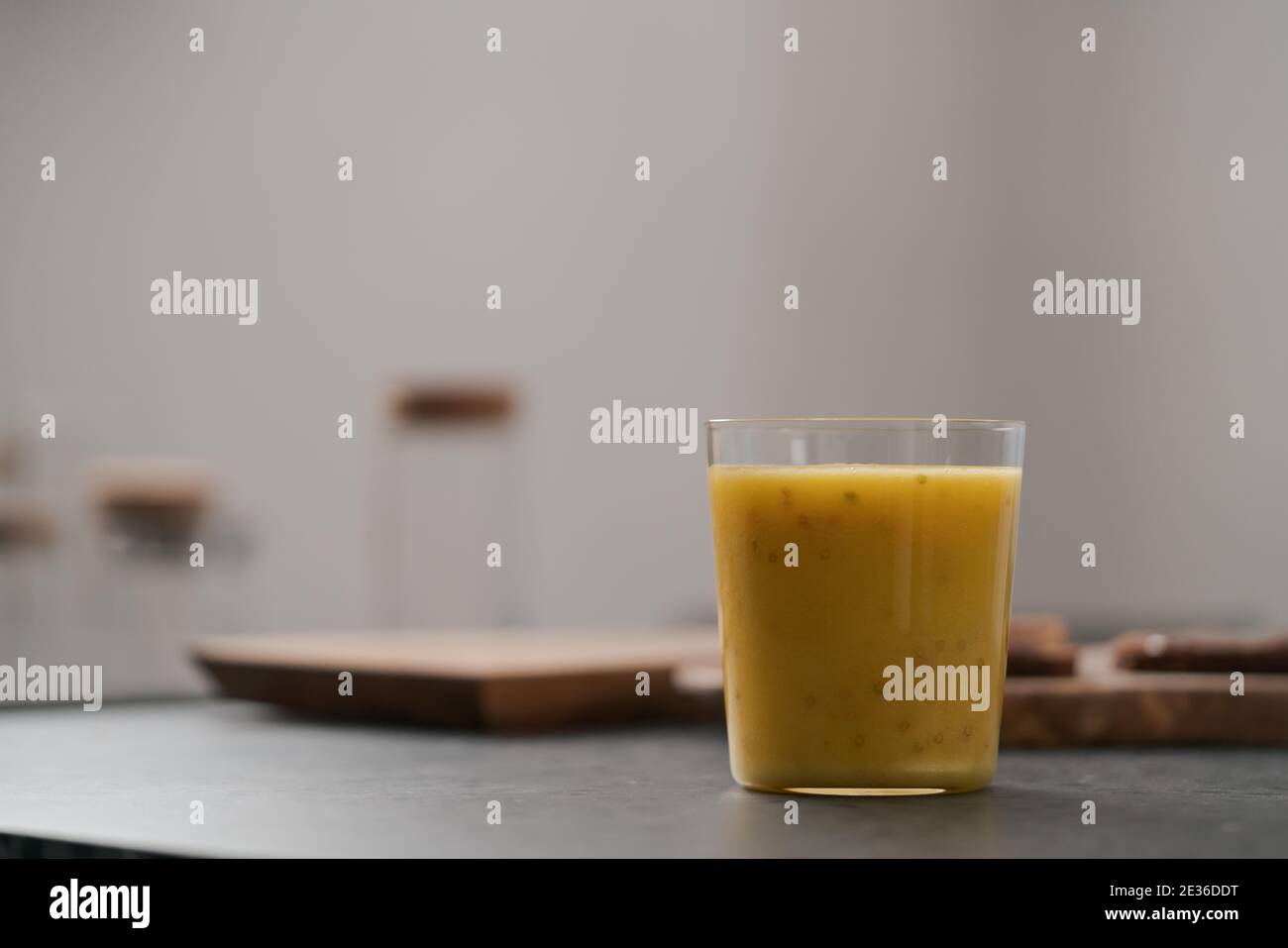 Fresh mango lulo smoothie on kitchen countertop, shallow focus Stock ...