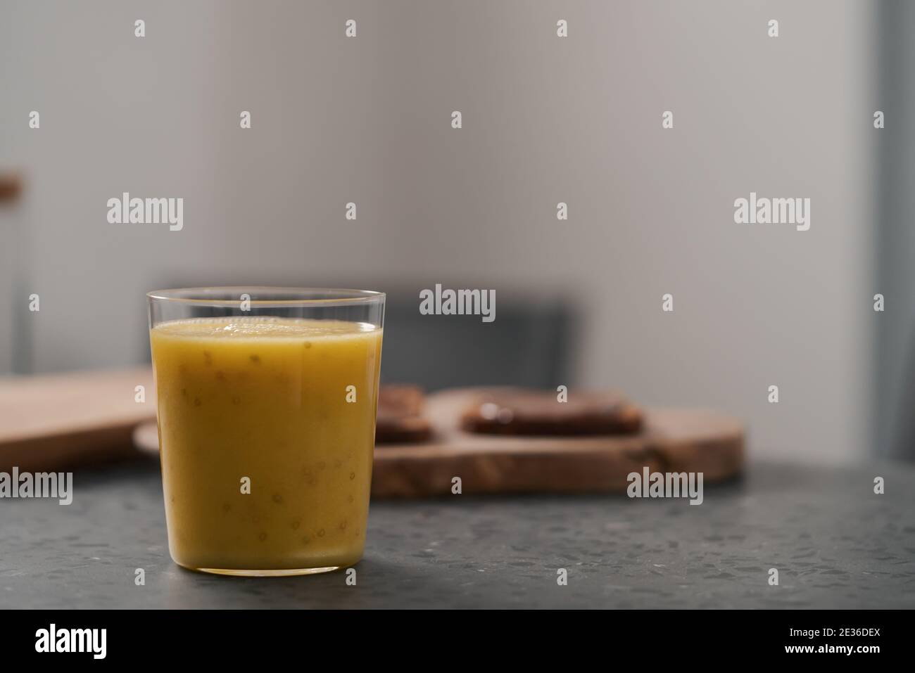 Fresh mango lulo smoothie on kitchen countertop, shallow focus Stock ...