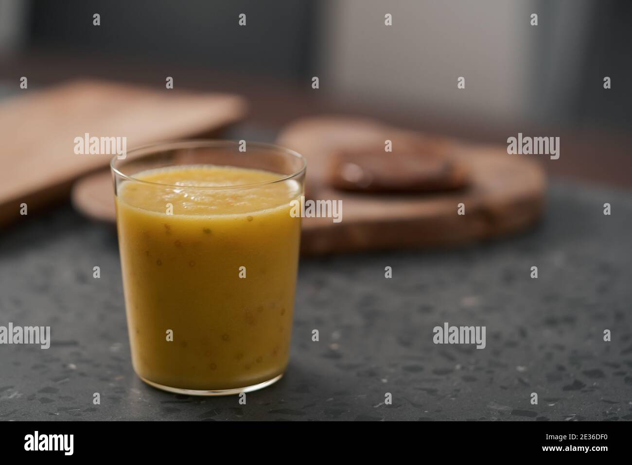 Fresh mango lulo smoothie on kitchen countertop, shallow focus Stock ...
