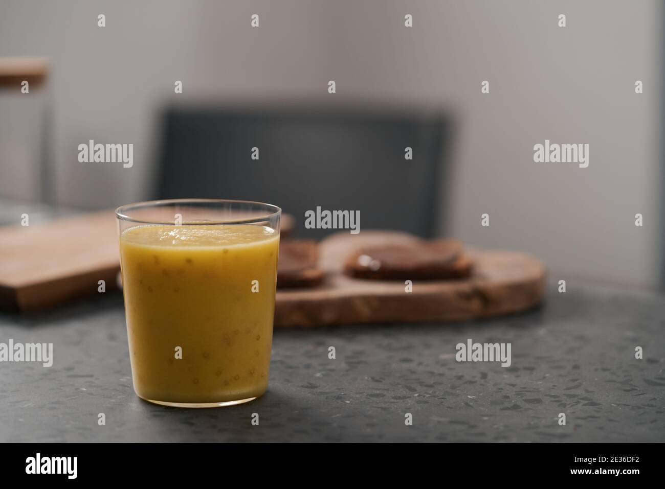 Fresh mango lulo smoothie on kitchen countertop, shallow focus Stock ...