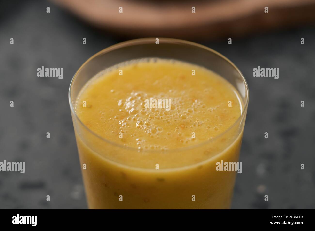 Fresh mango lulo smoothie on kitchen countertop, shallow focus Stock ...