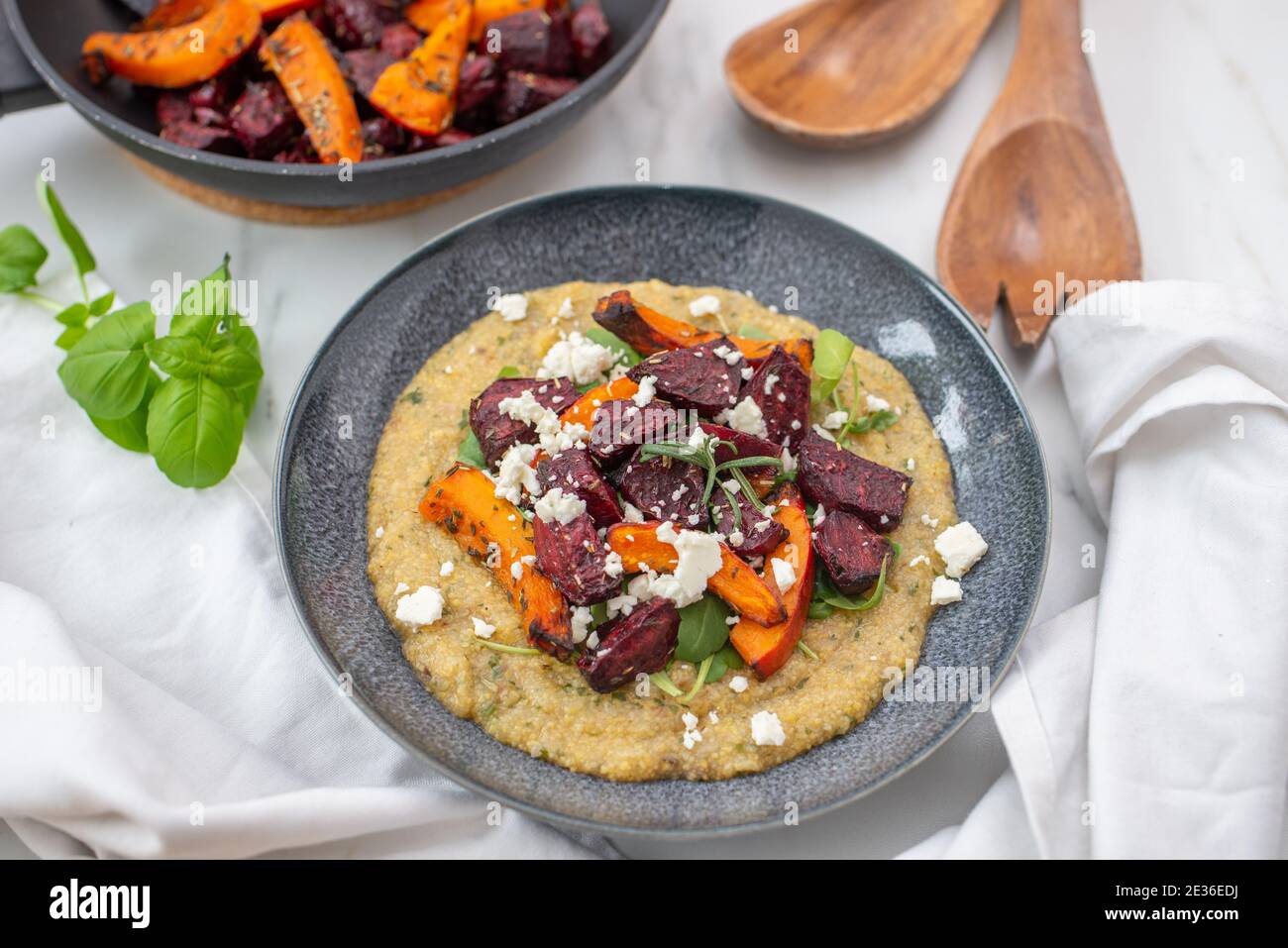 healthy plant-based food, vegan roasted veggies with polenta dish Stock ...