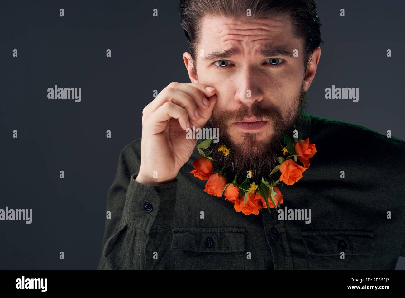 Bearded man with flowers decoration romance attractive look close-up ...