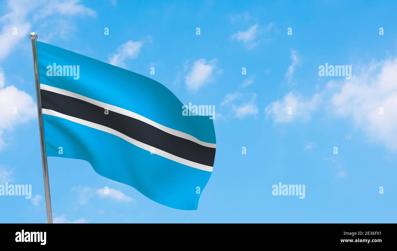 Botswana flag on pole. Blue sky. National flag of Botswana Stock Photo ...