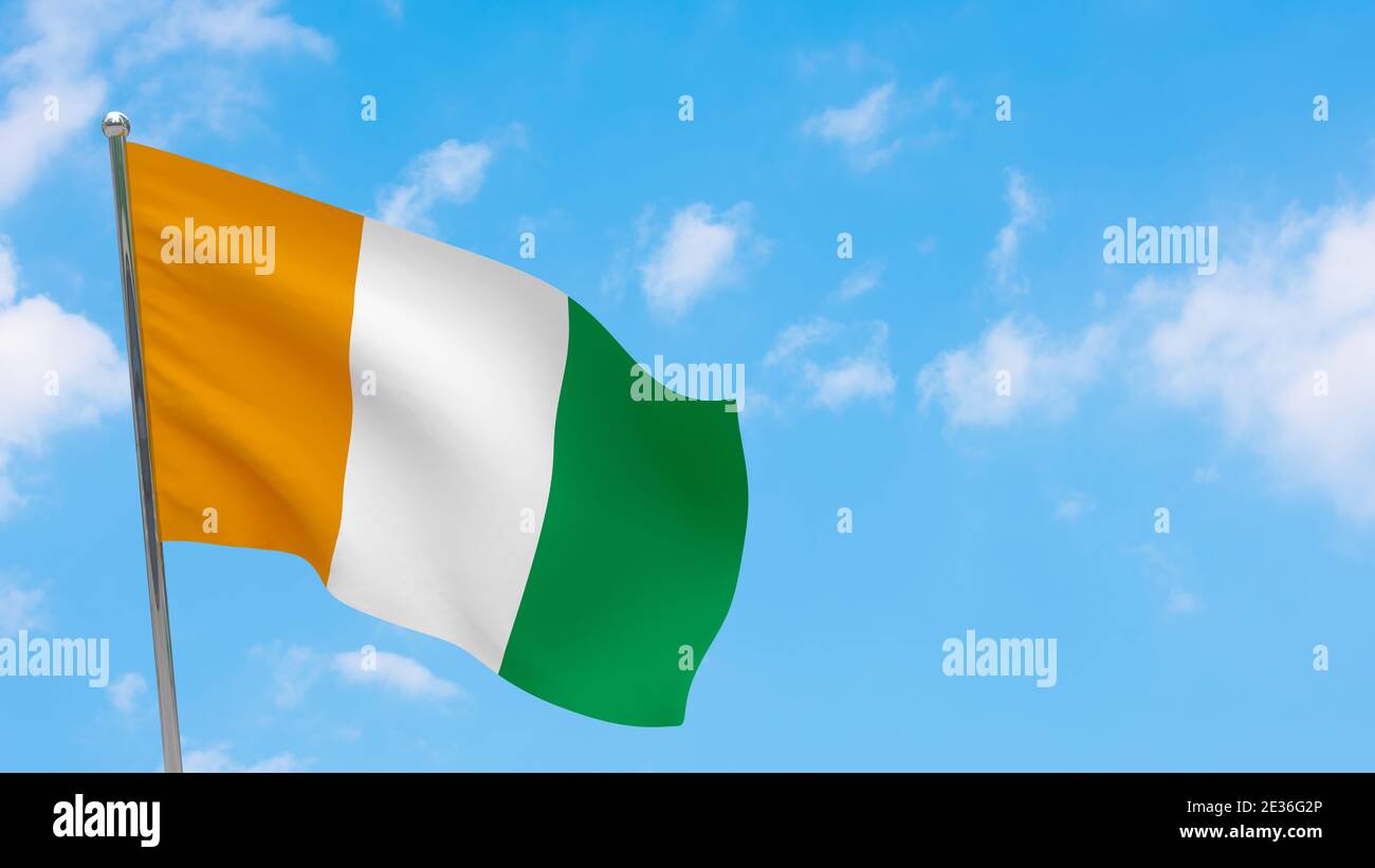 Cote d'ivoire - Ivory Coast flag on pole. Blue sky. National flag of ...