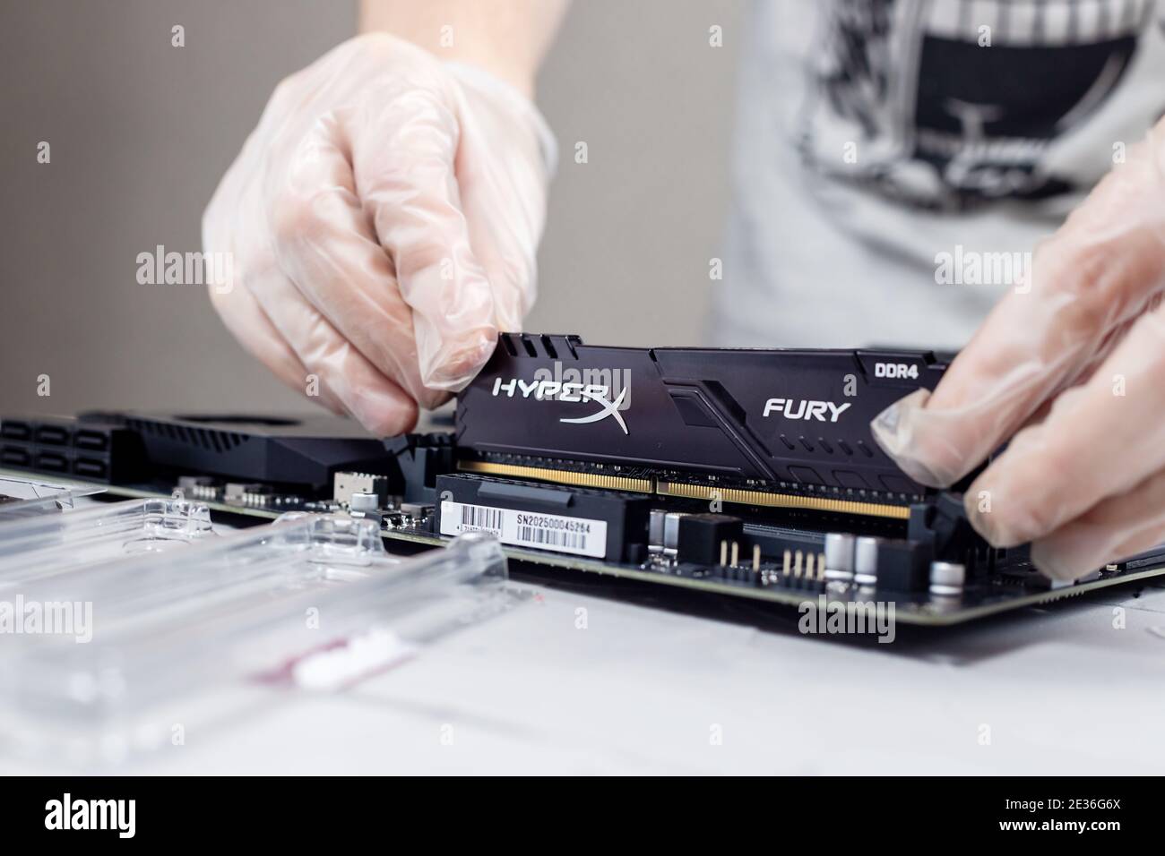 Moscow, Russia -25 Dec 2020: Installing ram memory module on desktop ...