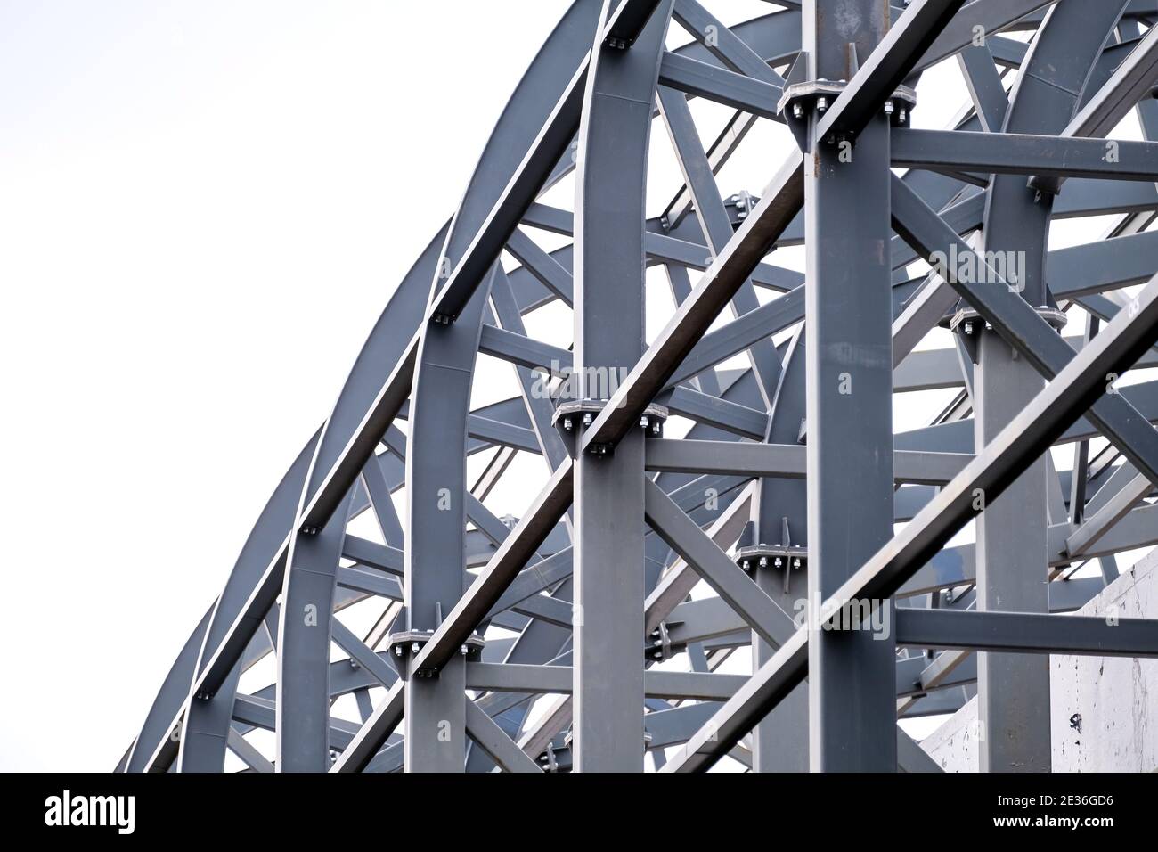 Row of stadium roof metal supports structure. Industrial steel ...