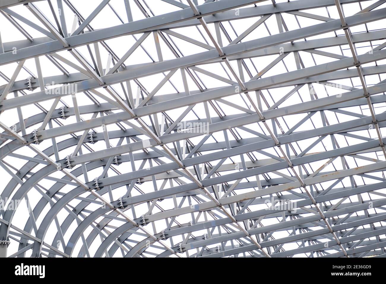 Row of stadium roof metal supports structure. Industrial steel ...