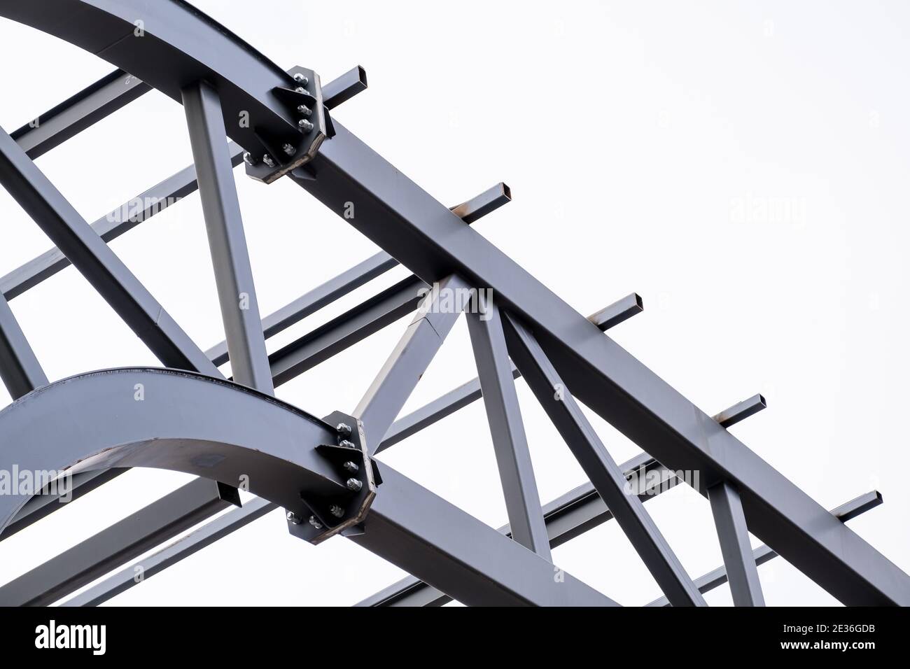 Row of stadium roof metal supports structure. Industrial steel ...