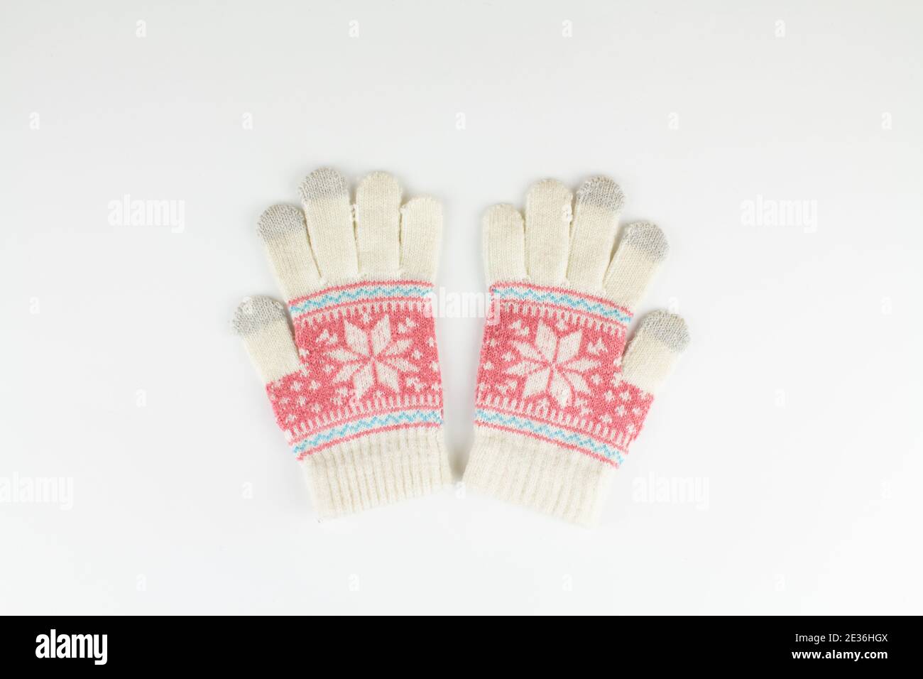 Pair soft pink knitted gloves hi-res stock photography and images - Alamy