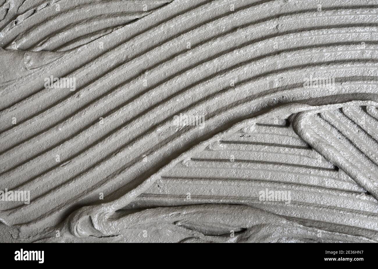 Fresh concrete tehture. Wet mortar surface. Lined grey concrete as ...