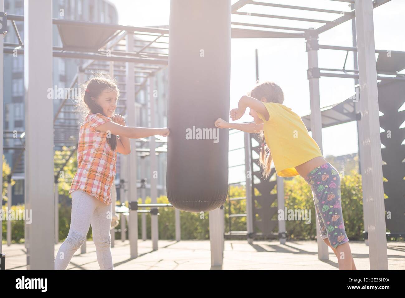 Kids having fun on the playground Stock Photo - Alamy
