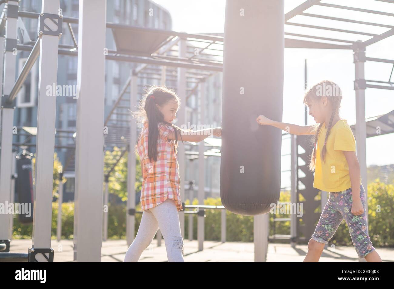Kids having fun on the playground Stock Photo - Alamy