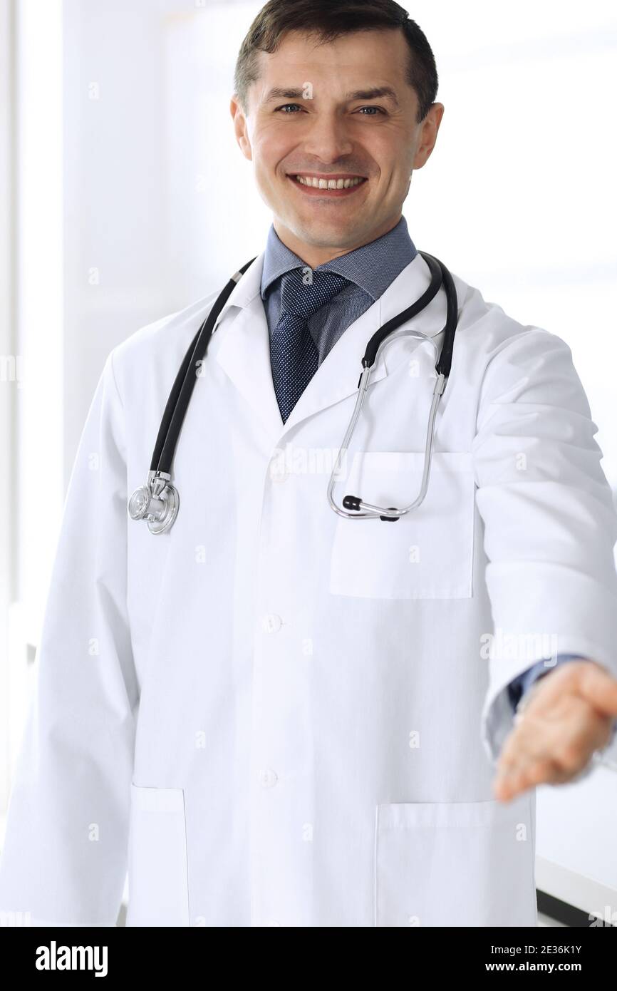 Doctor man cheerful smiling at camera, helping hand. Perfect medical ...