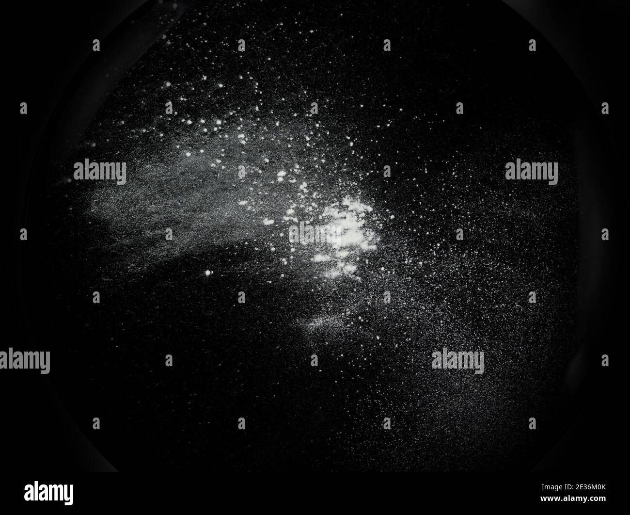 White powder isolated on black background. Abstract white powder ...