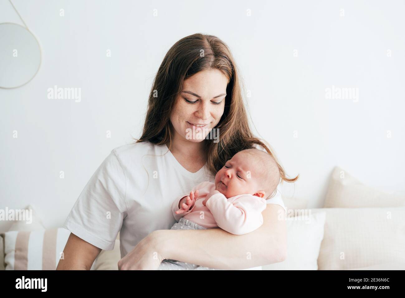 Newborn nurturing hi-res stock photography and images - Alamy
