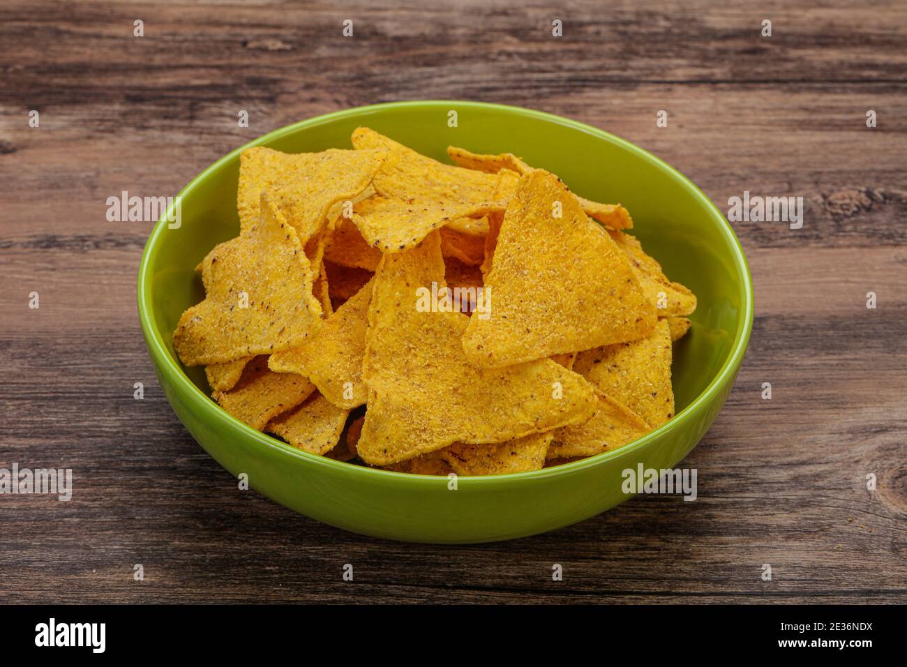 Mexican crunchy corn nachos triangle heap Stock Photo - Alamy