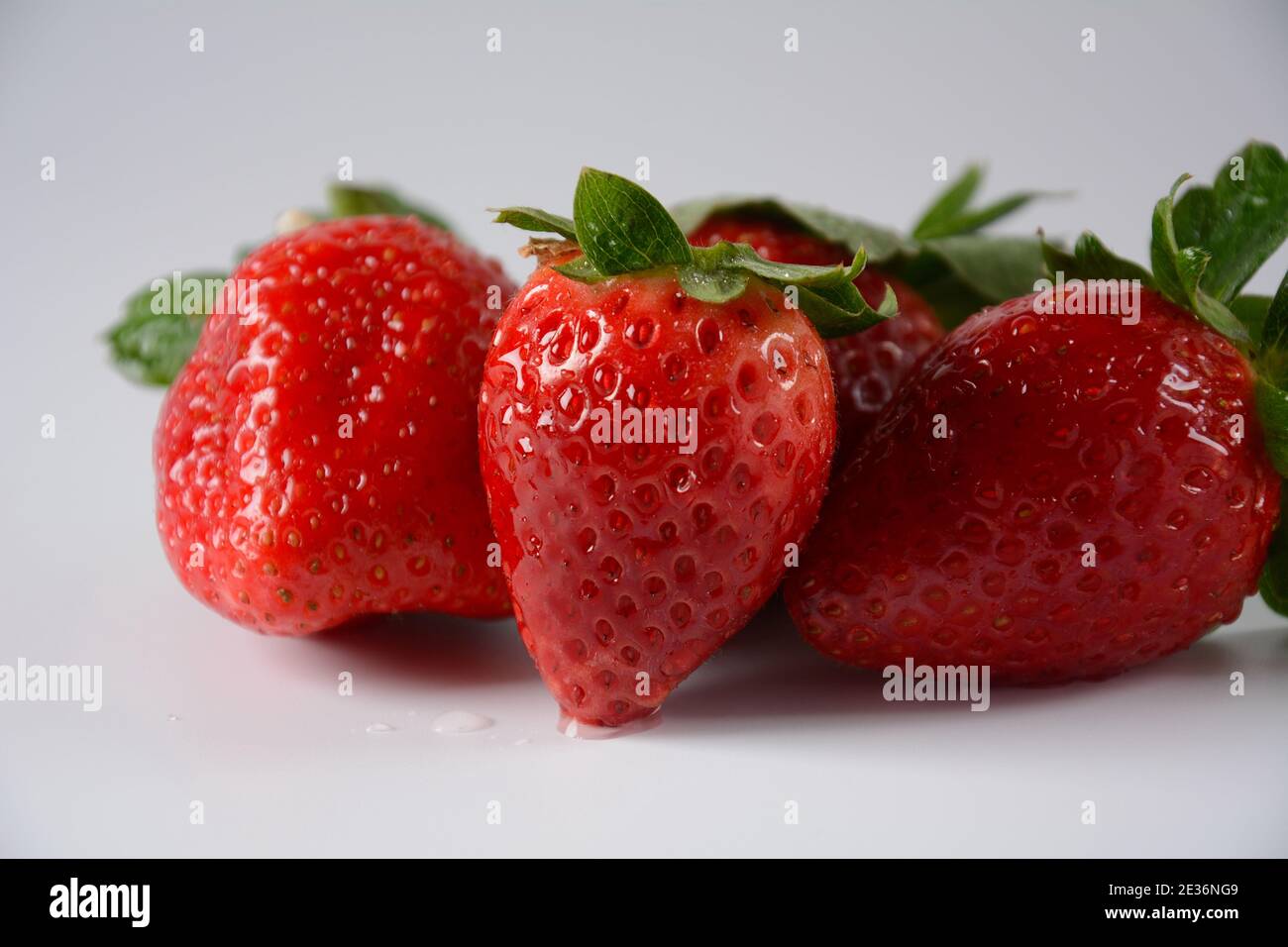 Strawberry fresh organic fruit. Strawberries with leaves. Isolated on a ...