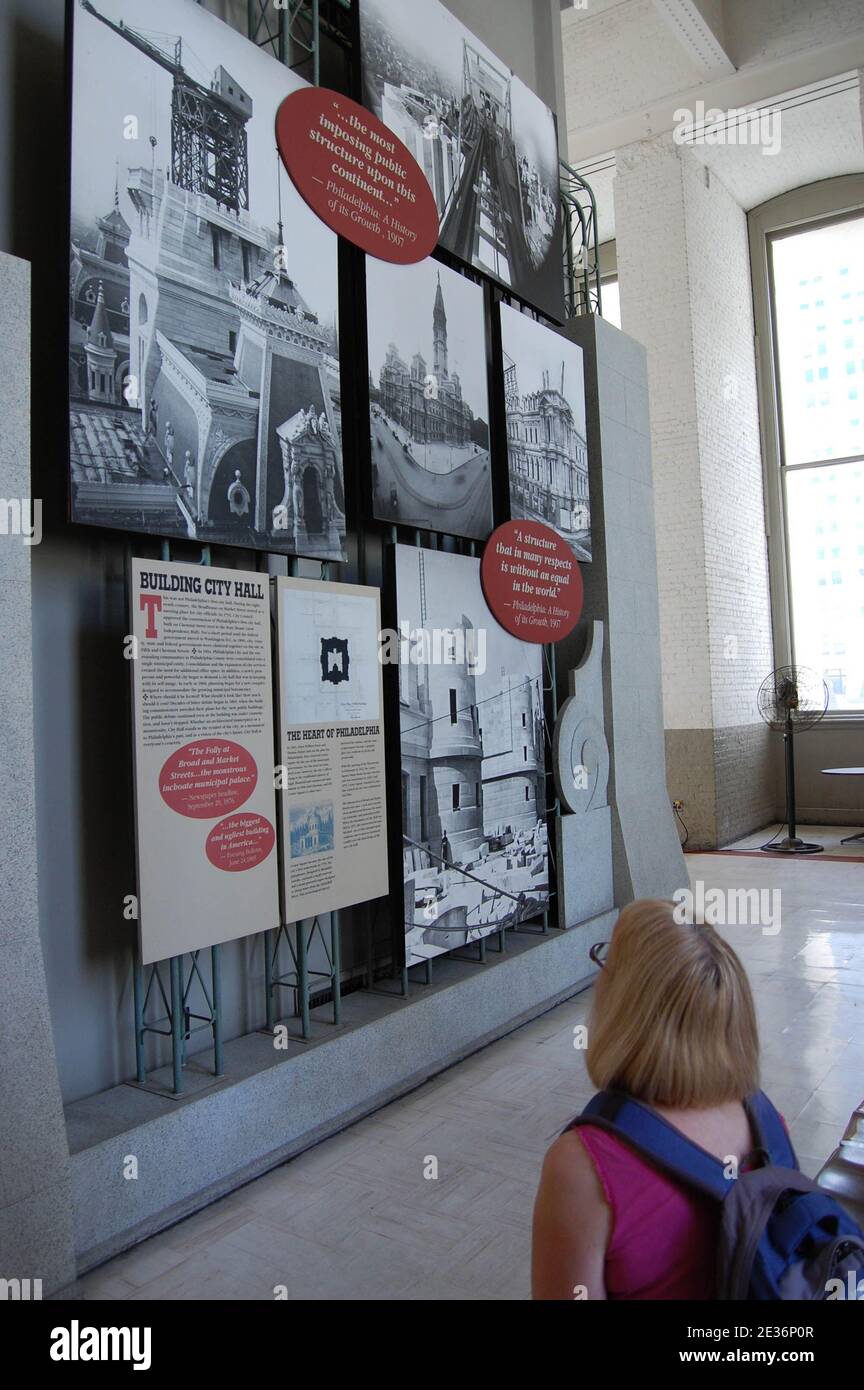 City Hall Philadelphia USA information board inside reading girl blonde ...