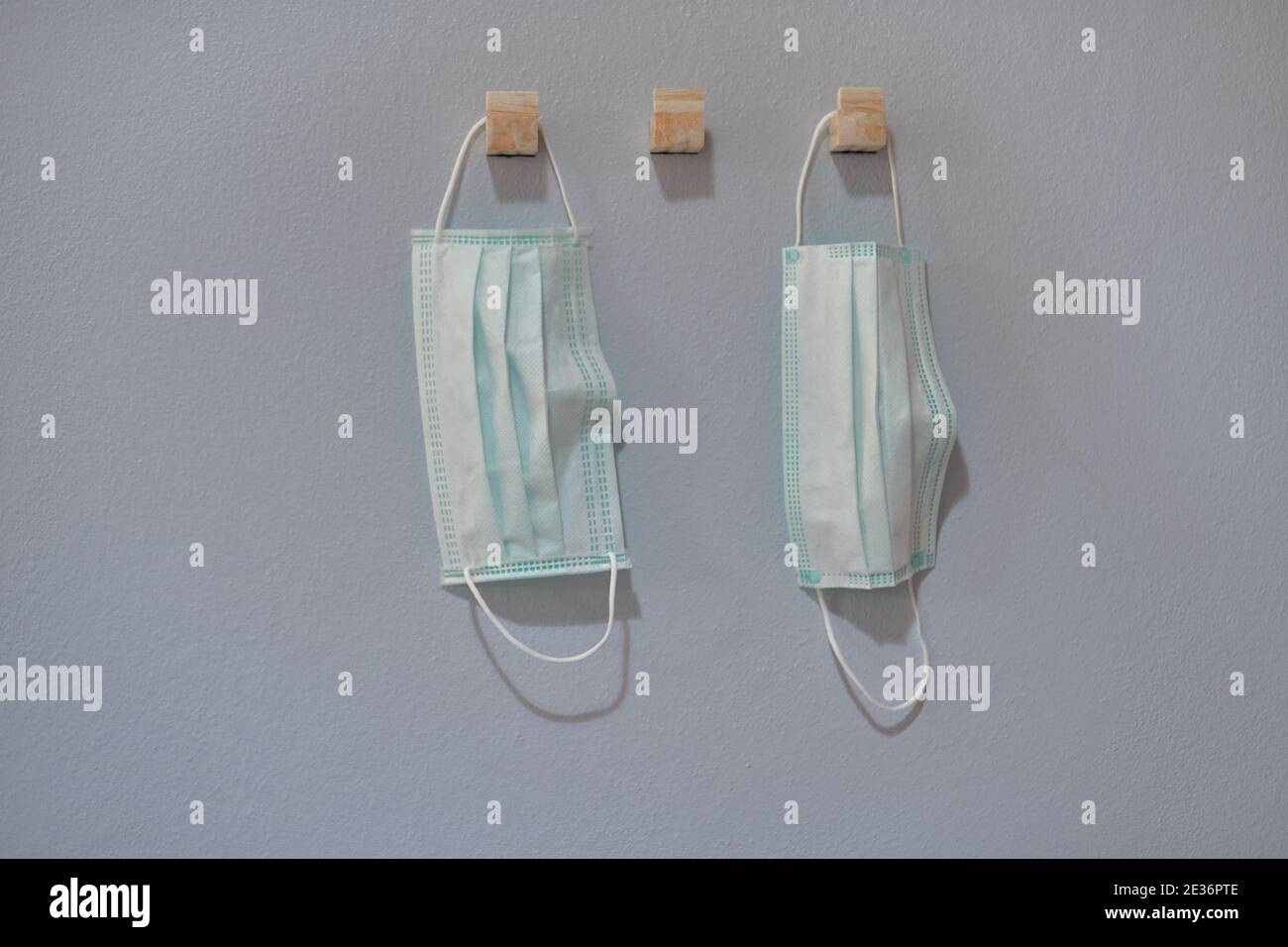 The surgical masks hanging on the wall Stock Photo - Alamy