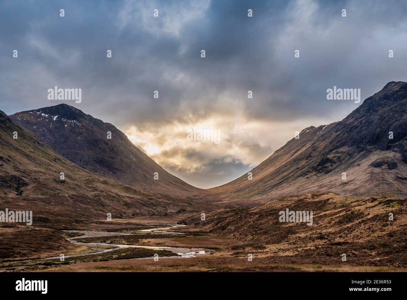 Stunning landscape image view down Glencoe Valley in Scottish Highlands ...