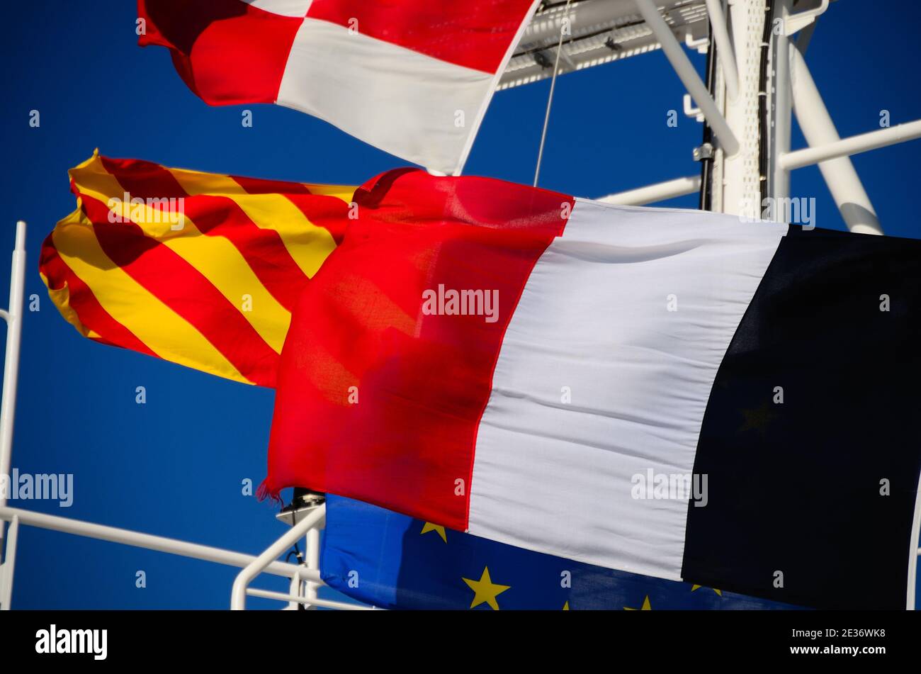 many colorful flags on a cruise ship Stock Photo - Alamy