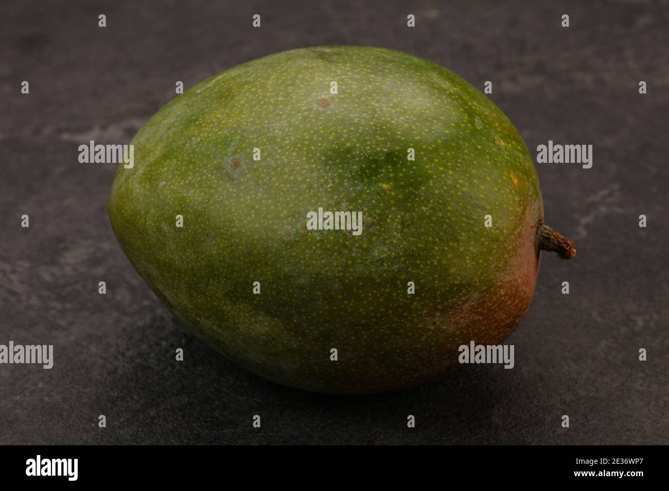 Tropical fruit - Green sweet tasty mango Stock Photo - Alamy