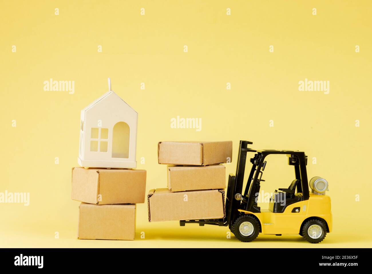 Mini forklift truck load cardboard boxes in the Airplane. Fast delivery ...