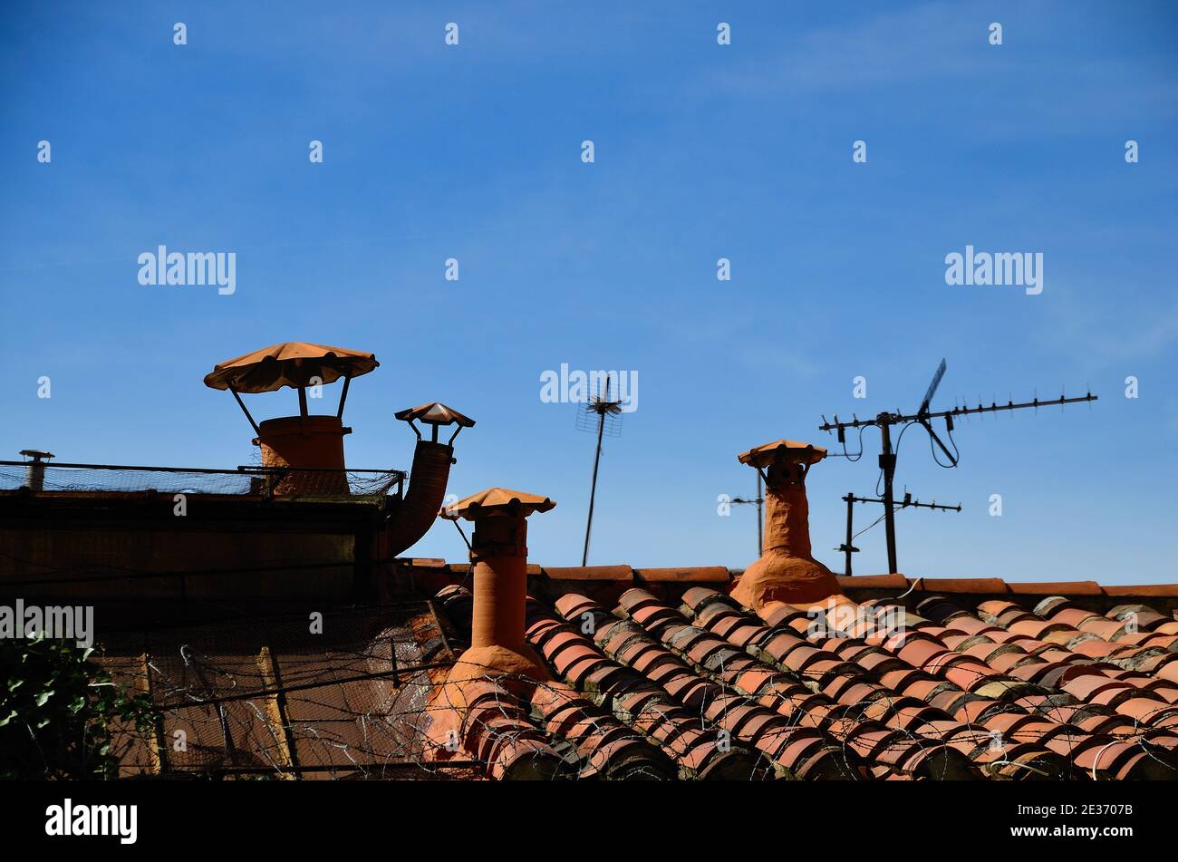 Old house with many chimneys hi-res stock photography and images - Alamy