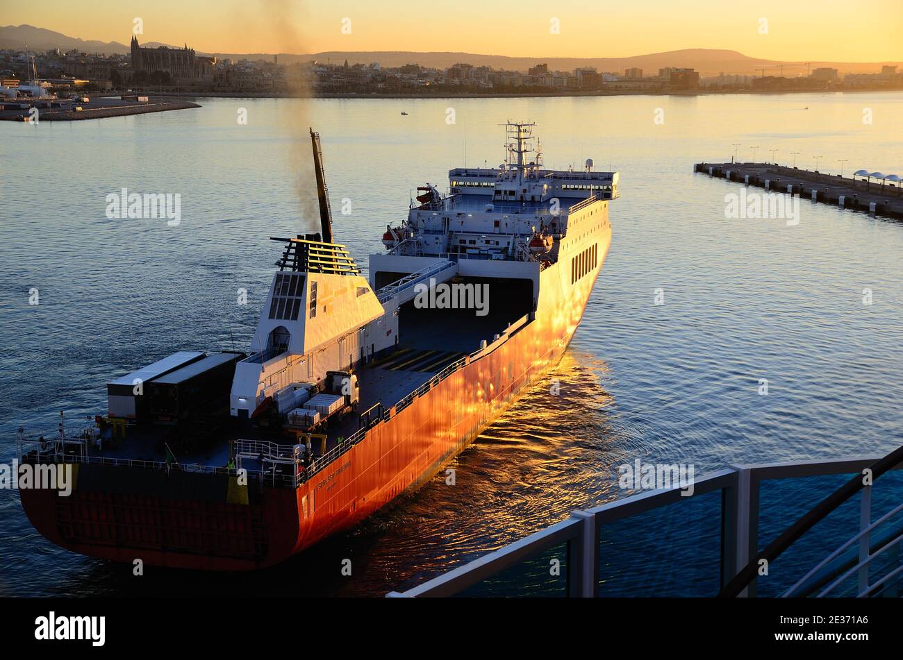 big ship turns the port of Barcelona Stock Photo - Alamy