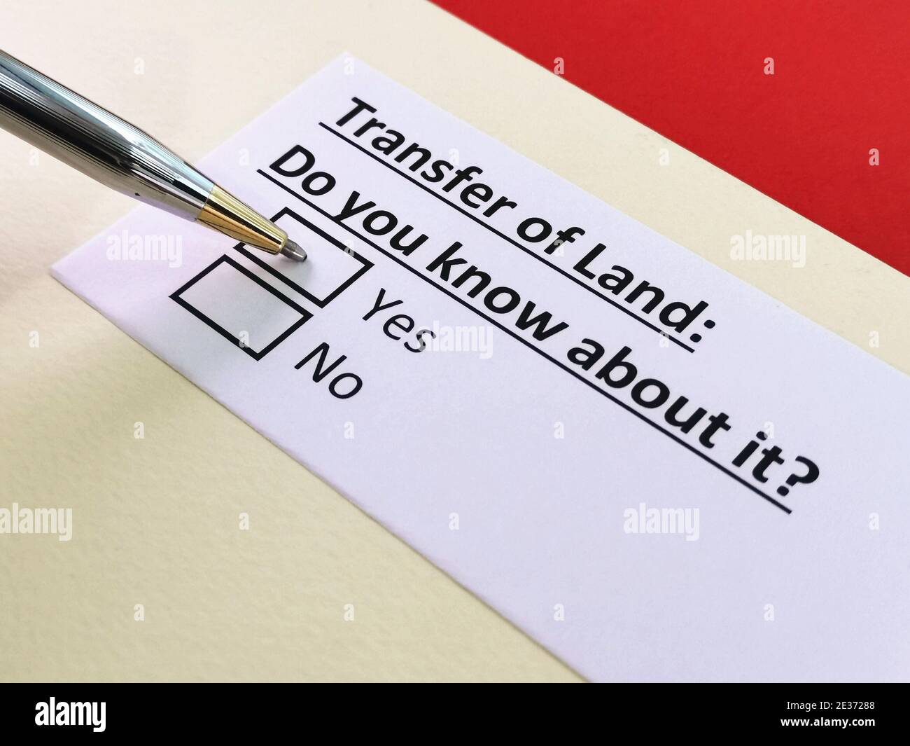 One person is answering question about transfer of land Stock Photo - Alamy