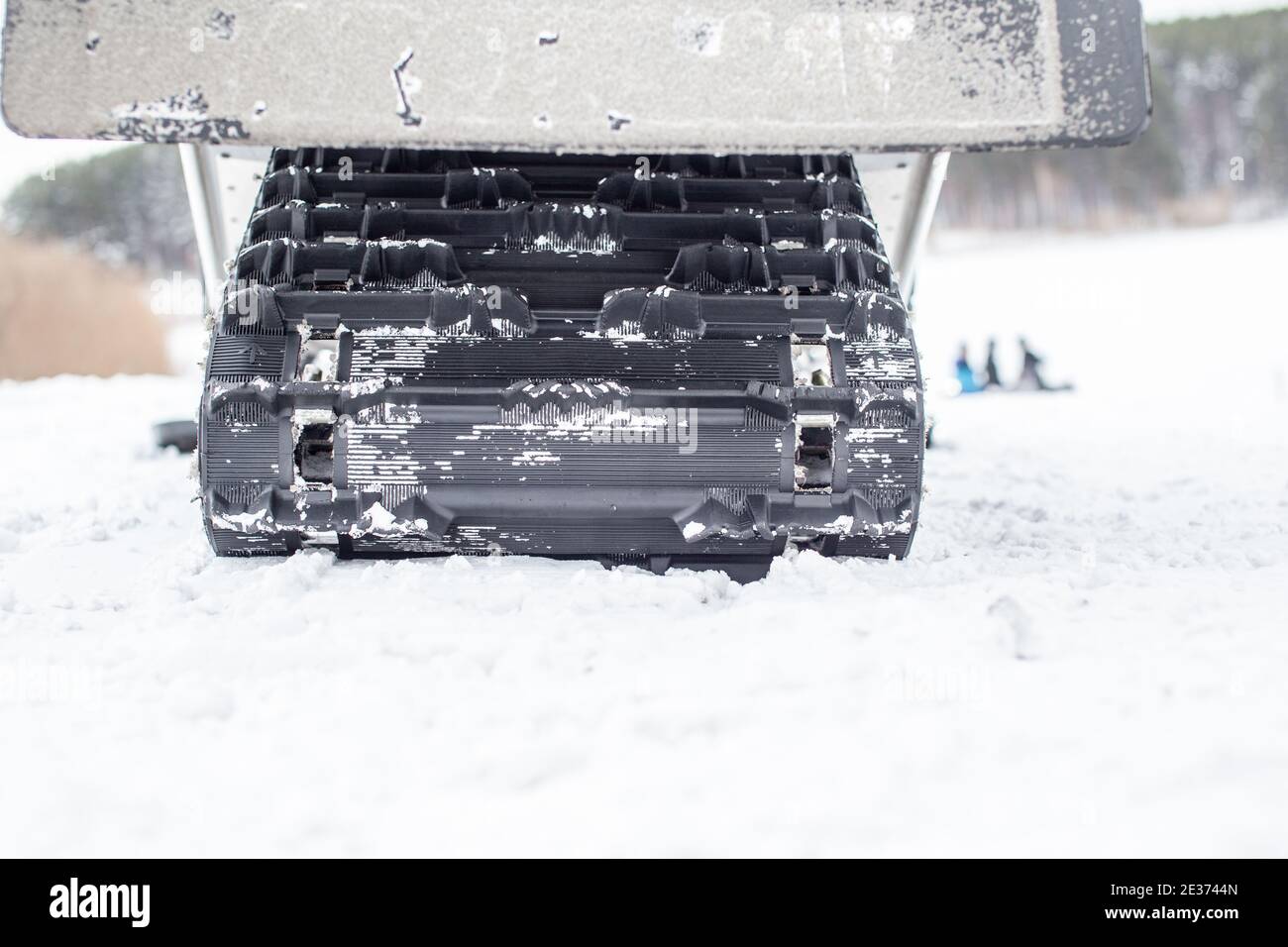 The back of the snowmobile in winter. Riding in the snow on a ...