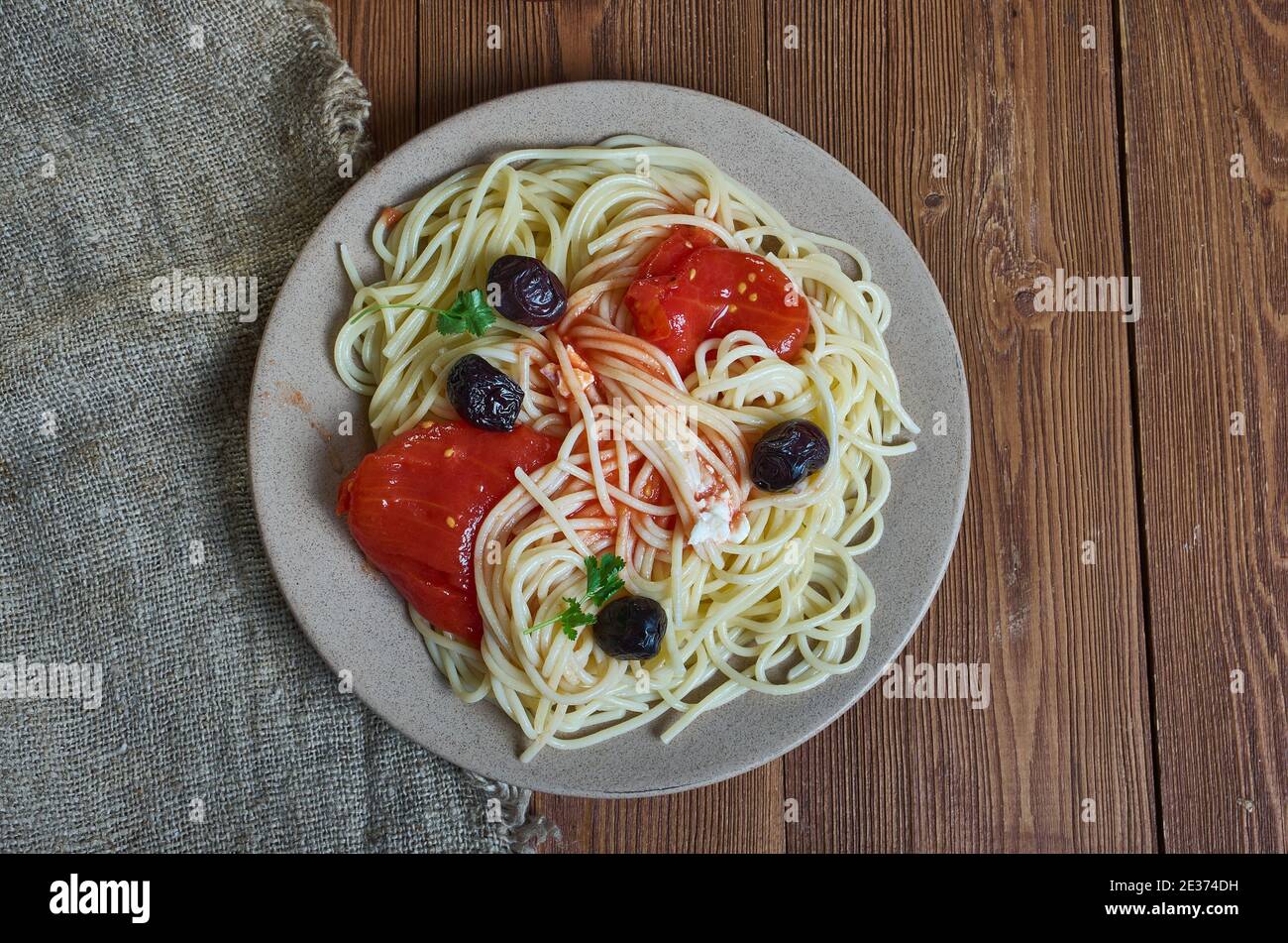 Italian pasta puttanesca tomato sauce hi-res stock photography and ...