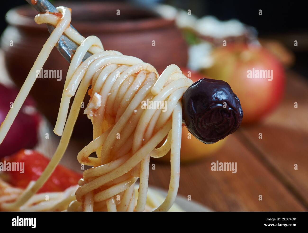 Italian pasta puttanesca tomato hi-res stock photography and images - Alamy
