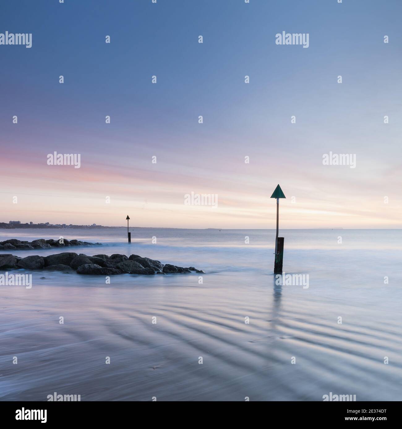 Groyne markers on sandbanks beach, poole Stock Photo - Alamy