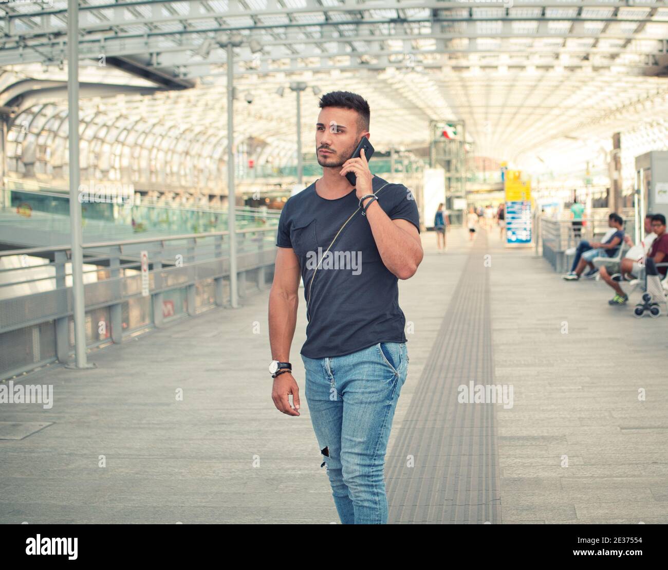 Young man train platform mobile hi-res stock photography and images - Alamy
